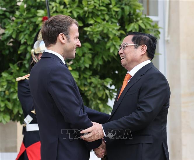 PM Pham Minh Chinh meets President of France Emmanuel Macron - VNA ...