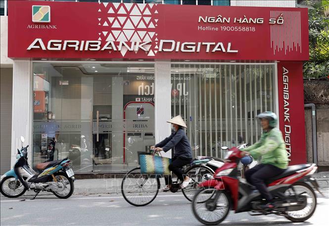 Ngành Ngân hàng tích cực chuyển đổi số - Ảnh thời sự trong nước - Kinh ...