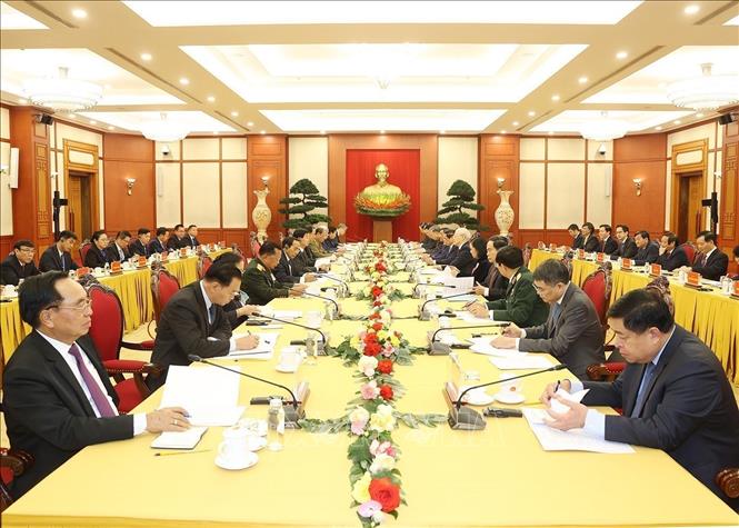 Top leaders of Vietnamese, Lao Parties meet in Hanoi - VNA Photos ...