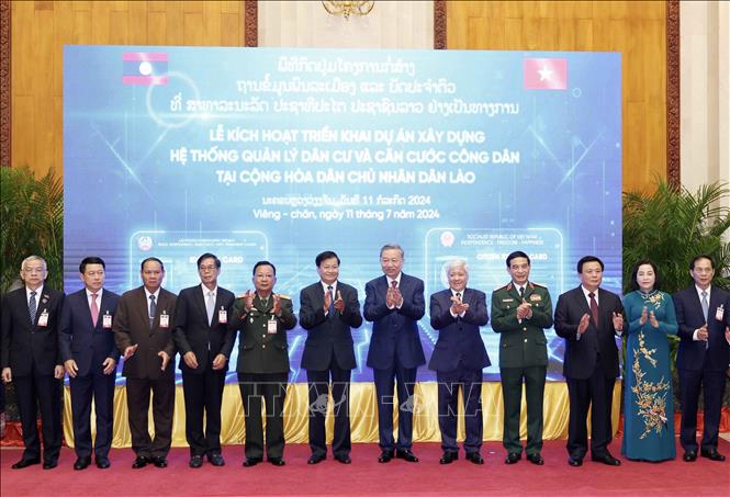 Vietnamese, Lao leaders launch project to build resident system in Laos ...