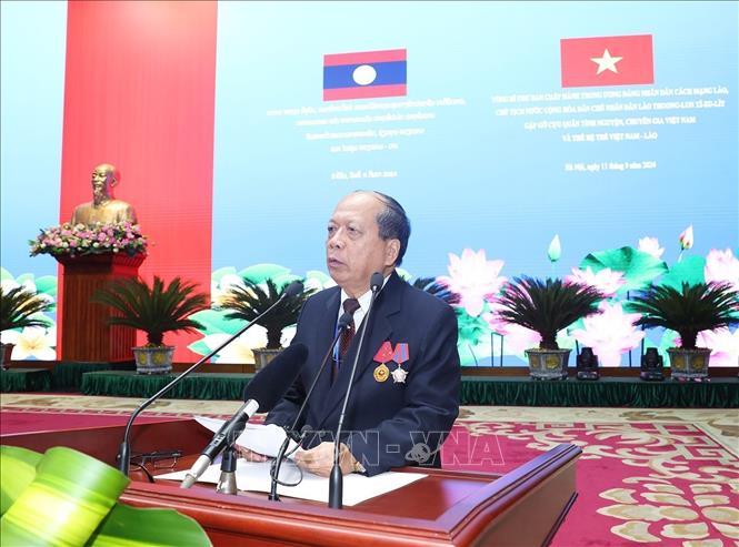Tổng Bí thư, Chủ tịch nước Lào gặp cựu quân tình nguyện, chuyên gia ...