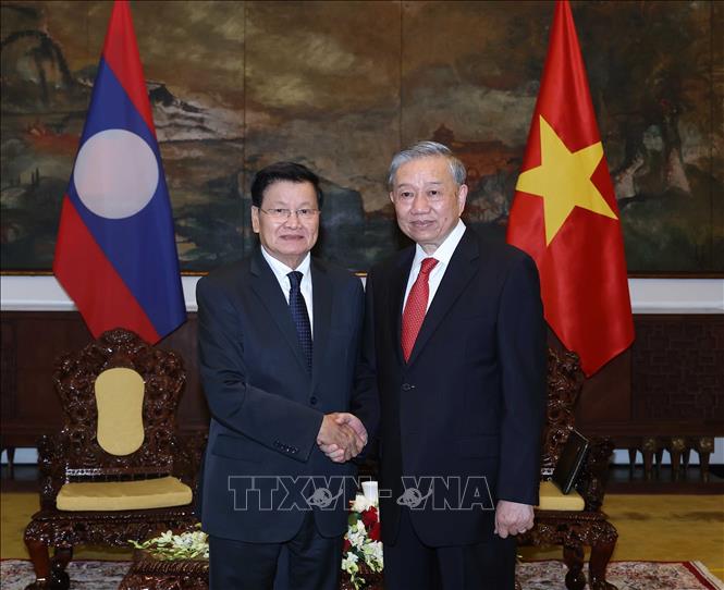 Party chief welcomes Lao top leader for 50th national reunification ...