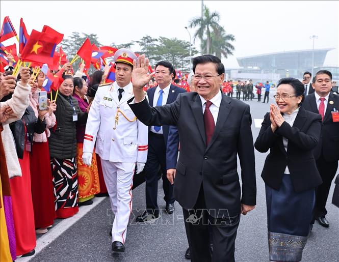 Top Lao leader arrives in Hanoi, beginning state visit to Vietnam - VNA ...