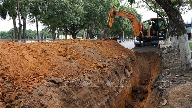 Khai quật mộ liệt sĩ tập thể tại đường Trường Chinh (Quảng Ngãi) - Ảnh ...