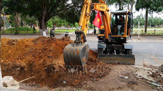 Khai quật mộ liệt sĩ tập thể tại đường Trường Chinh (Quảng Ngãi) - Ảnh ...
