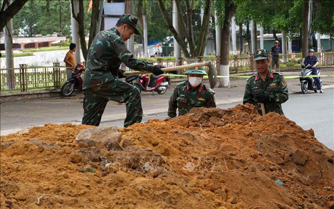 Khai quật mộ liệt sĩ tập thể tại đường Trường Chinh (Quảng Ngãi) - Ảnh ...
